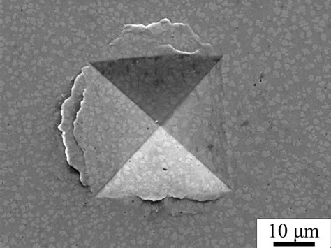 sem secondary electron image of the indentation site showing