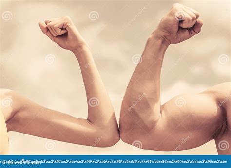 Sporty Man And Woman Muscular Arm Vs Weak Hand Vs Fight Hard Stock Image Image Of Body