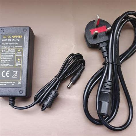 全新 Jch 1250 12v 5a 5000ma 火牛 Power Supply Adapter 適合 Magic Tv 機頂盒 電視盒子 Nas 外置硬碟盒 二手或全新網絡 Wifi