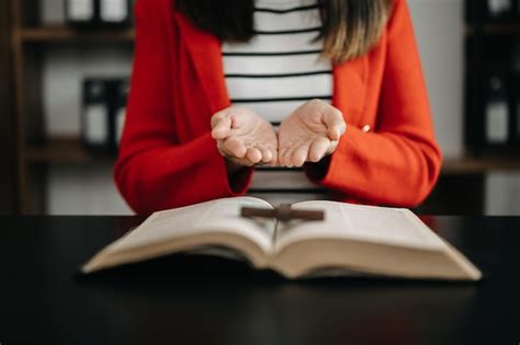 Premium Photo Woman Praying On Holy Bible In The Morningwoman Hand With Bible Praying