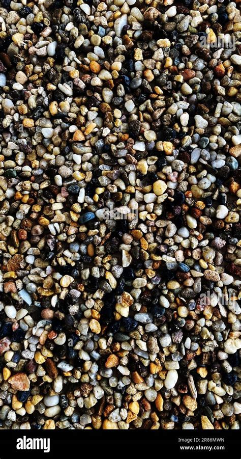 A Collection Of Colorful Pebbles Creating A Natural Pattern Stock Photo Alamy