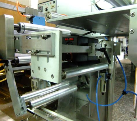 Dk1300a High Speed Ink Roll Coder Solid Ink Roller Expiry Date Coder For Packaging Machine