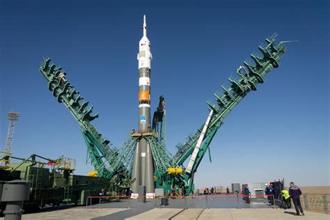 Soyuz Rocket Launching New Crew To Space Station Rolls Out To Launch Pad