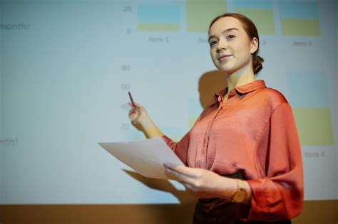 Premium Photo Smiling Young Woman Presenting Data