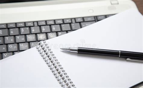 Pen And Notepad On The Computer Keyboard Stock Image Image Of Concept