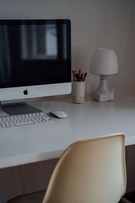 Vertical Shot Of The Computer On The White Working Desk In A Modern Home Office Editorial Stock