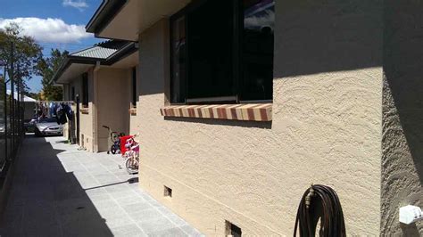 House Rendered Using Stucco Finish Charlie And Sons Rendering