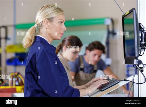Beautiful Female Engineer With Computer Stock Photo Alamy