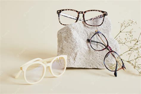Premium Photo Several Different Trebdy Eye Glasses With Fashion Frames And Concrete Podium On
