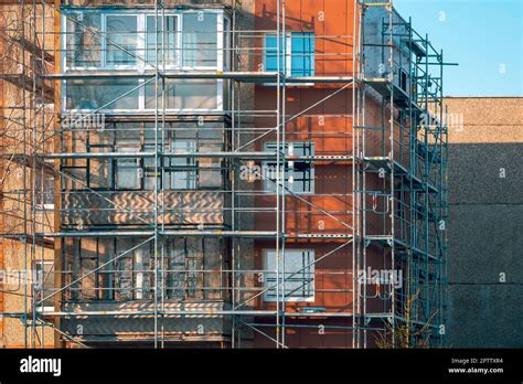 Tall Building Under Construction With Scaffolds Construction Site