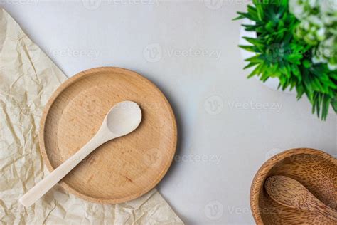 Wooden Utensils On The Kitchen Table Round Wooden Plates A Wooden