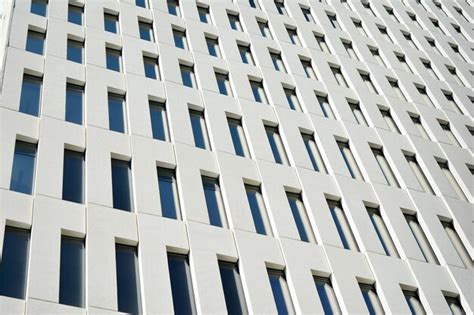 Premium Photo Modern Office Building Detail Perspective View Of Geometric Angular Concrete Windows