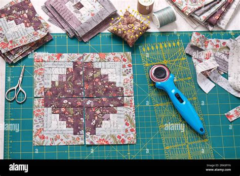 Patchwork Log Cabin Blocks On Craft Mat Stack Of Blocks Sewing