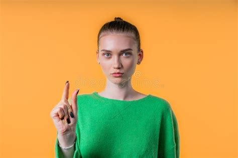 Young Woman Showing Small Invisible Abstract Subject Tiny Object Sizes