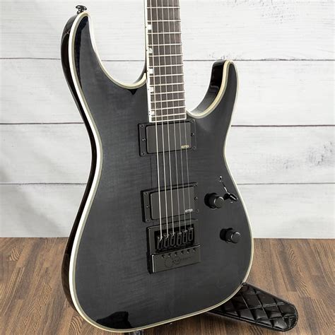 ESP MH 1000 EVERTUNE ELECTRIC GUITAR SEE THRU BLACK Serial Reverb