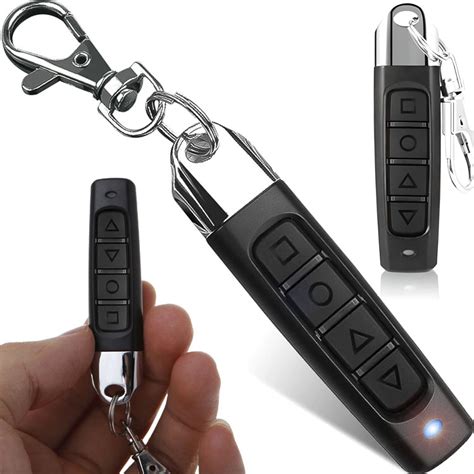 Универсално дистанционно с обучение 4 бутона фиксиран код 433mhz за ел порта гараж черно