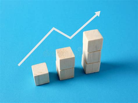 Wooden Blocks Forming Increasing Graph On Blue Background Stock Image