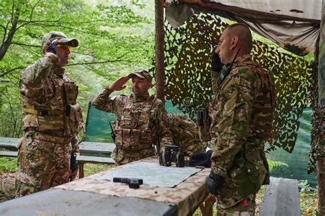 A Highly Trained Military Unit Strategizes And Organizes A Tactical