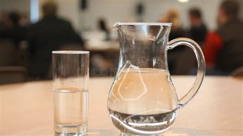 Cup And Pitcher Filled With Water Stand On Table Stock Video Video Of Seat Glass 321263739