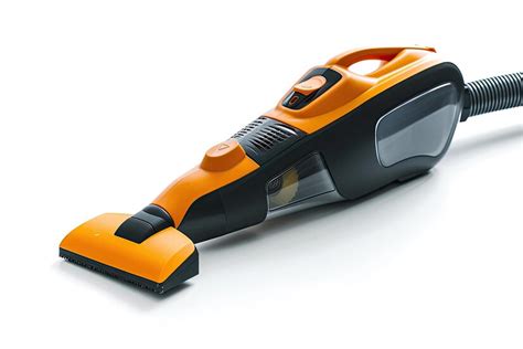 Hand Held Accu Vacuum Cleaner Isolated On White Premium Ai Generated Image