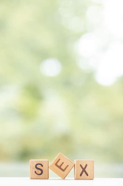 Premium Photo The Word Sex On Wooden Cubes They Lie On Other Cubes