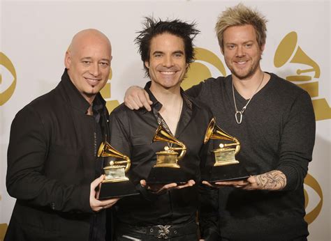Train With Their Grammys For Hey Soul Sister At The 2011 Grammy