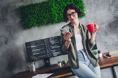 Young Professional Programmer Working Remotely In A Stylish Office With
