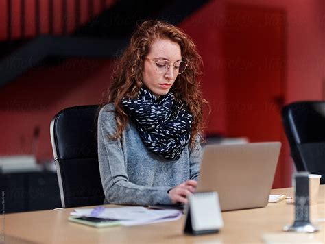Woman Typing On Laptop At Late Night By Stocksy Contributor Guille