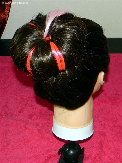 How To Style Hair Up With A Sock Bun And Colored Extensions