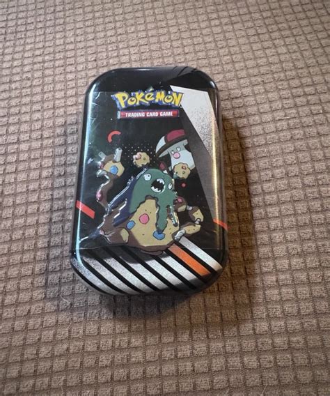 PokÉmon Black Bolt And White Flare Unova Mini Tin Garbodor And Amoongus