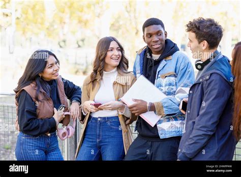 University Babes Discussing On Campus Stock Photo Alamy