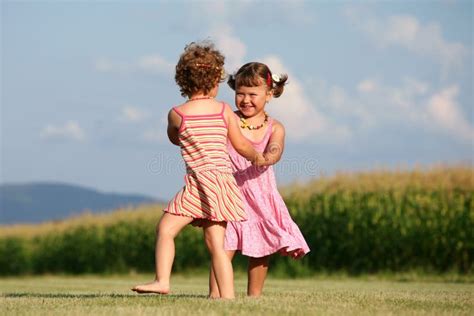Two Girls Playing Outdoors Stock Image Image Of Field 12784117