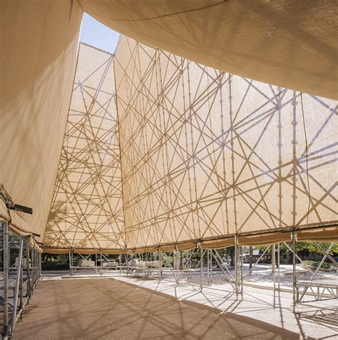 Aire Pavilion Wrapped By Giant Scaffolding Represents Unfinished