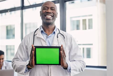 Doctor Black Man And Tablet Green Screen In Hospital Portrait For