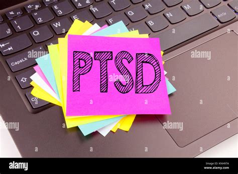 Writing PTSD Post Traumatic Stress Disorder Text Made In The Office Close Up On Laptop Computer