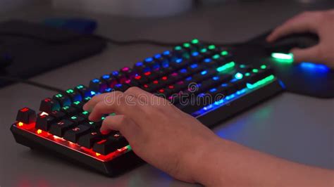 An Esports Player Plays Games On A Gaming Keyboard And Mouse With Rgb Backlight Stock Footage