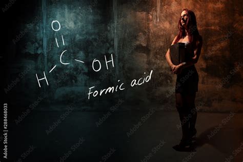 Sexy Girl Or Secretary Or Female Babe Presenting Handdrawn Chemical Formula Of Formic Acid