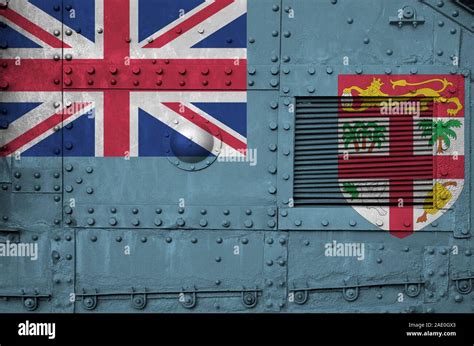Fiji Flag Depicted On Side Part Of Military Armored Tank Close Up Army