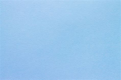 밝은 파란색 파스텔 종이 배경 다채로운 종이 질감 프리미엄 사진