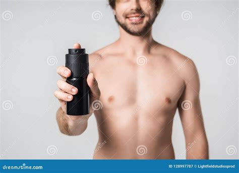 Selective Focus Of Shirtless Man With Male Deodorant Stock Image