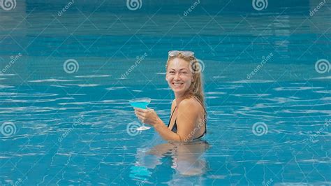 The Wide Middle Shot Pretty Woman Drinking Blue Cocktail Alcohol Liquor