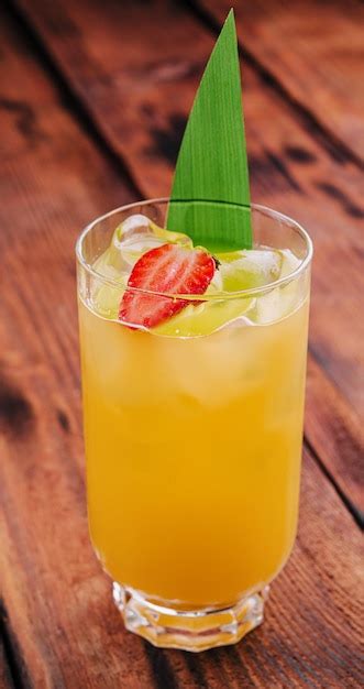 Premium Photo Mai Tai Cocktail With Pineapple And Rum With A Piece Of