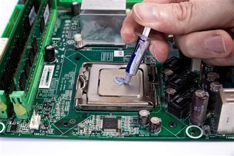 premium photo engineer repairman holding hands in black gloves chip