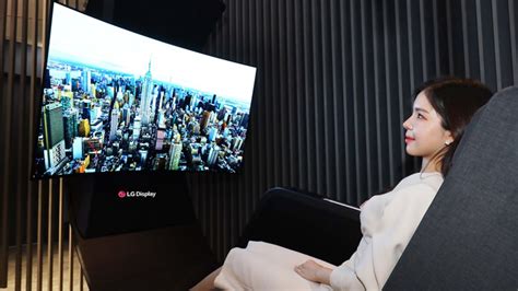 Lg Media Chair Recliner Comes With 55 Inch Rotating Oled Tv Maxim