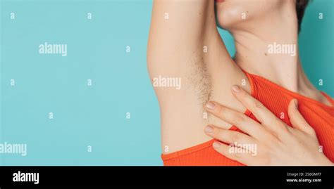 A Hairy Female Armpit A Woman Showing Natural Vegetation On Her Body