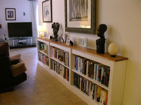 Bookcase Designed To Be Long Enough To Accommodate A Range Of Books High Enough But Not To