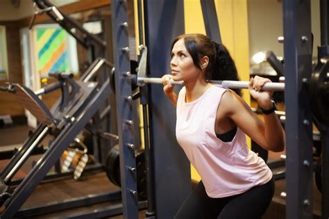 Premium Photo Fitness Girl Sexy Athletic Girl Working Out In Gym