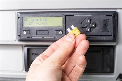 Premium Photo Close Up Of A Driver Holding A Fuse Speed Limiter Disabled By Pulling A Fuse Out