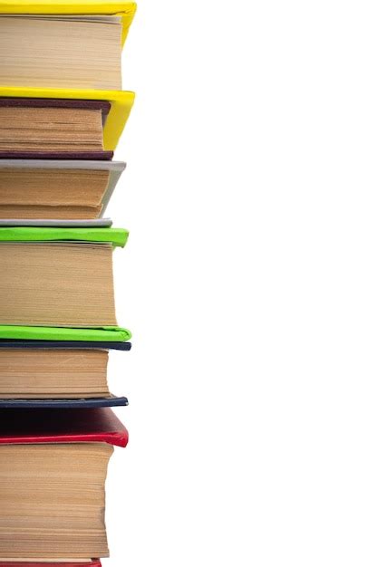 Premium Photo Stack Of Multicolored Books On White Isolated Background