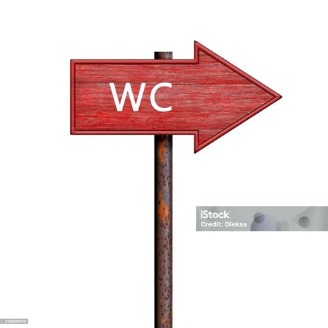 녹슨 기둥에 Wc 비문이 새겨진 빨간 나무 화살표 기호 오른쪽을 향한 방향 포인터입니다 흰색으로 절연 된 간판 0명에 대한 스톡